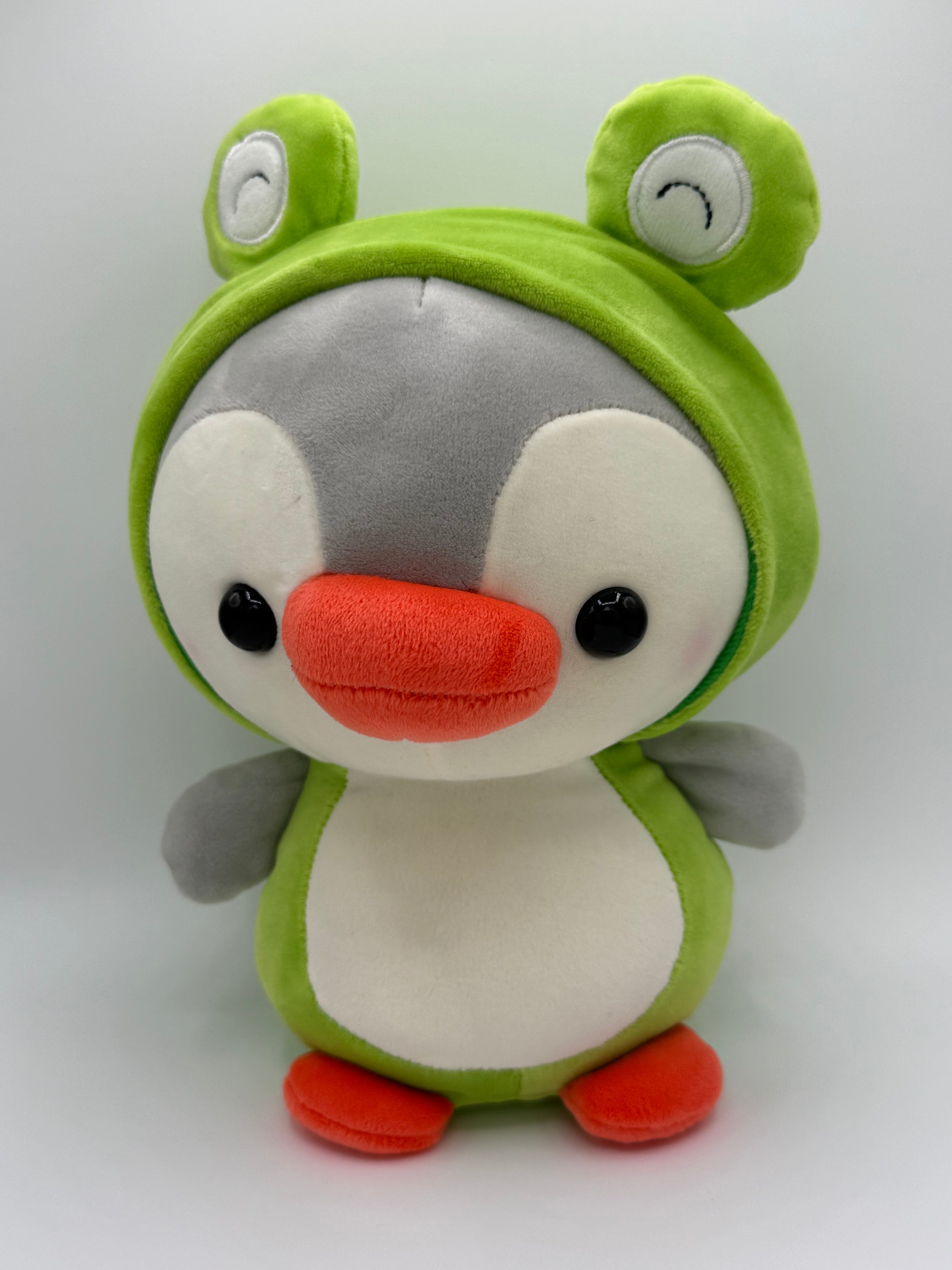Penguin Plushy dressed as frog – Colibri Box